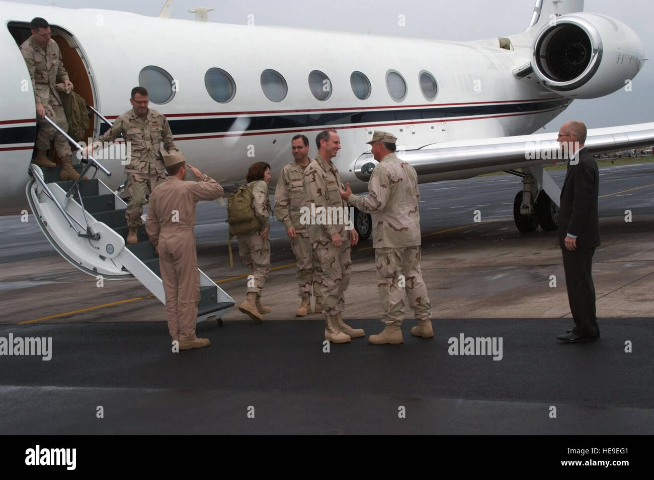 US Navy Admiral Jon Greenert (center), US Fleet Forces commander, is ...