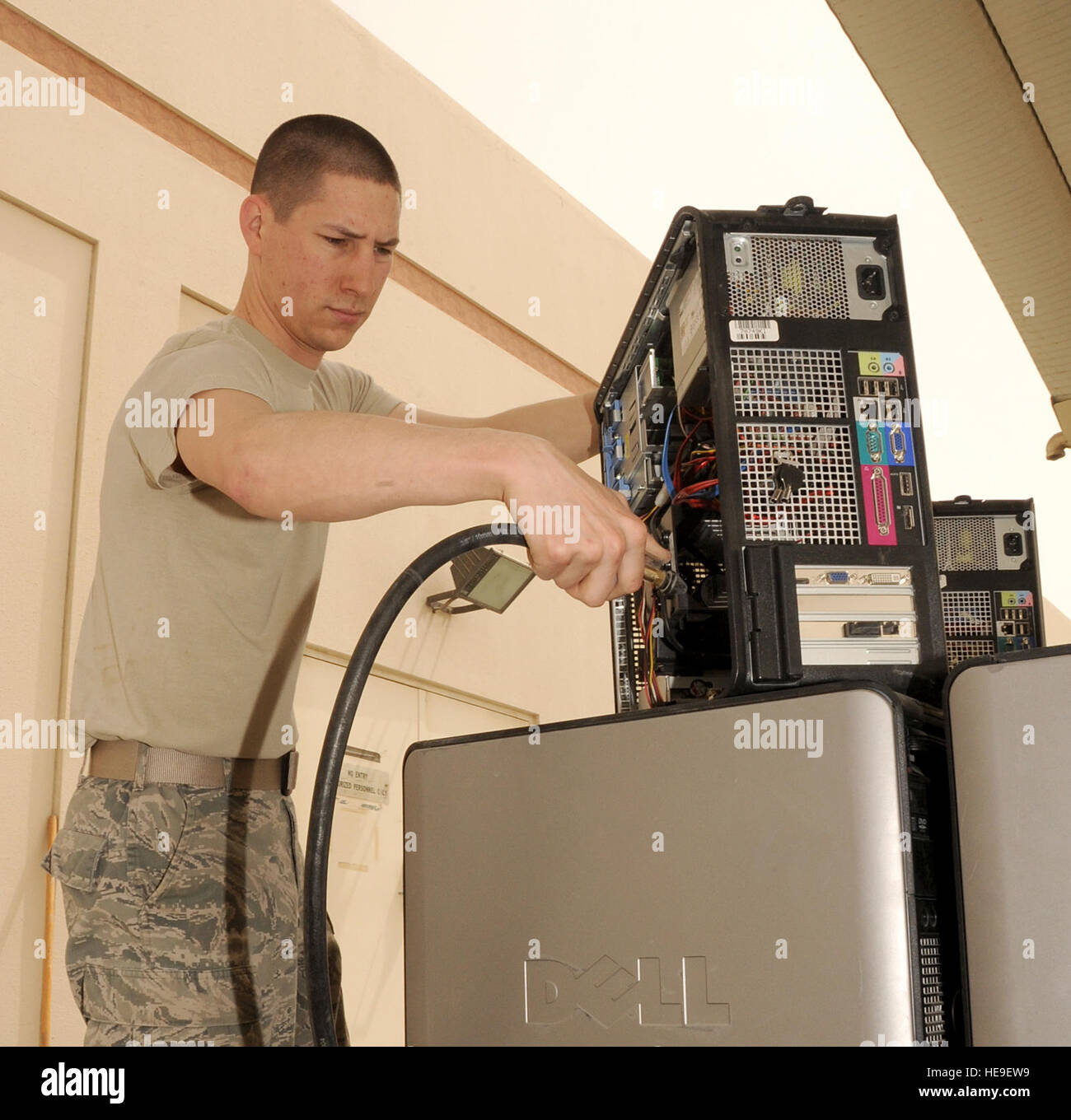 SOUTHWEST ASIA - Airman 1st Class Michael Dupre cleans computers with ...