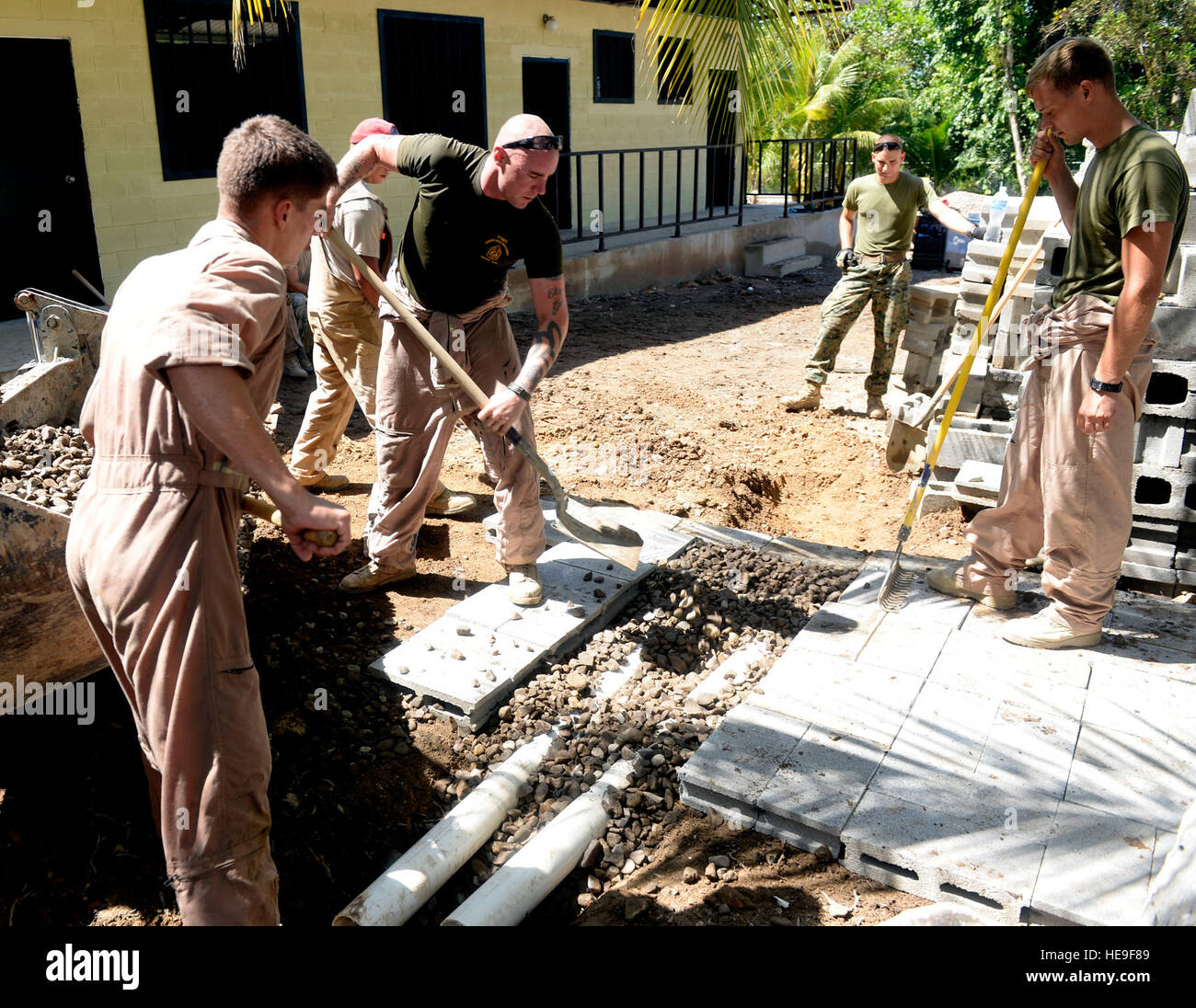 Airmen from the 823rd Expeditionary RED HORSE Squadron and Marines from ...