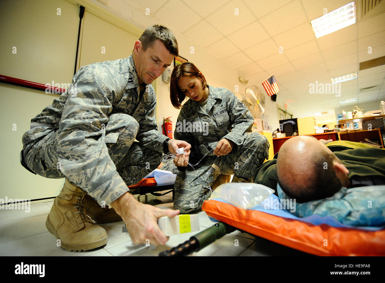 Capt. John Davis Brunner troubleshoots an intravenous pump as Senior ...