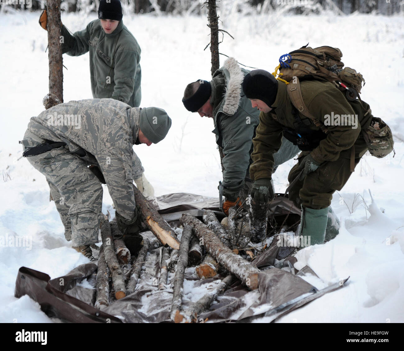 A Survival, Evasion, Resistance, and Escape specialist instructs Arctic ...