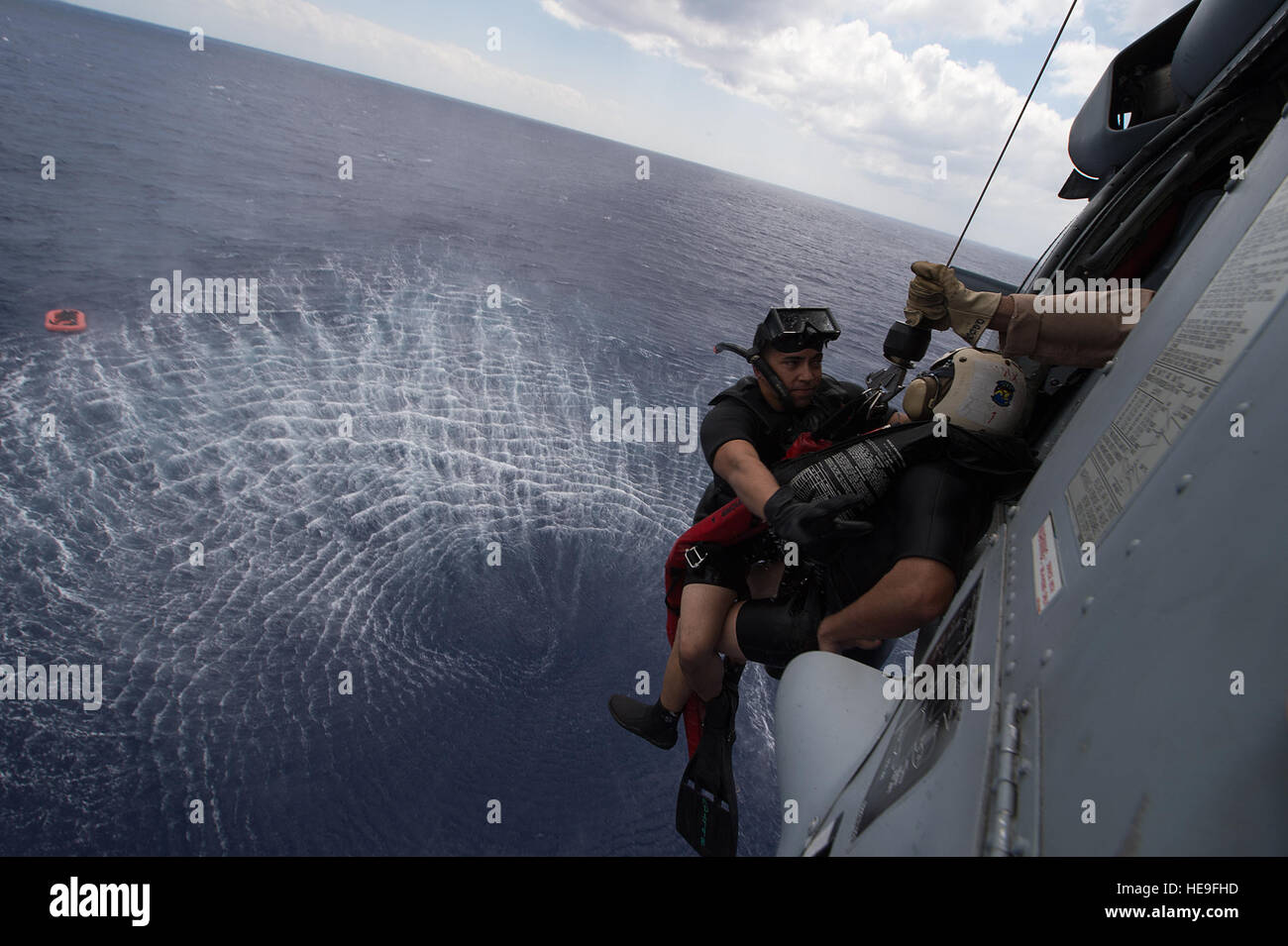 U.S. Navy Naval Aircrewman (AWS) (Helicopter) 3rd Class Ryan Fujii ...