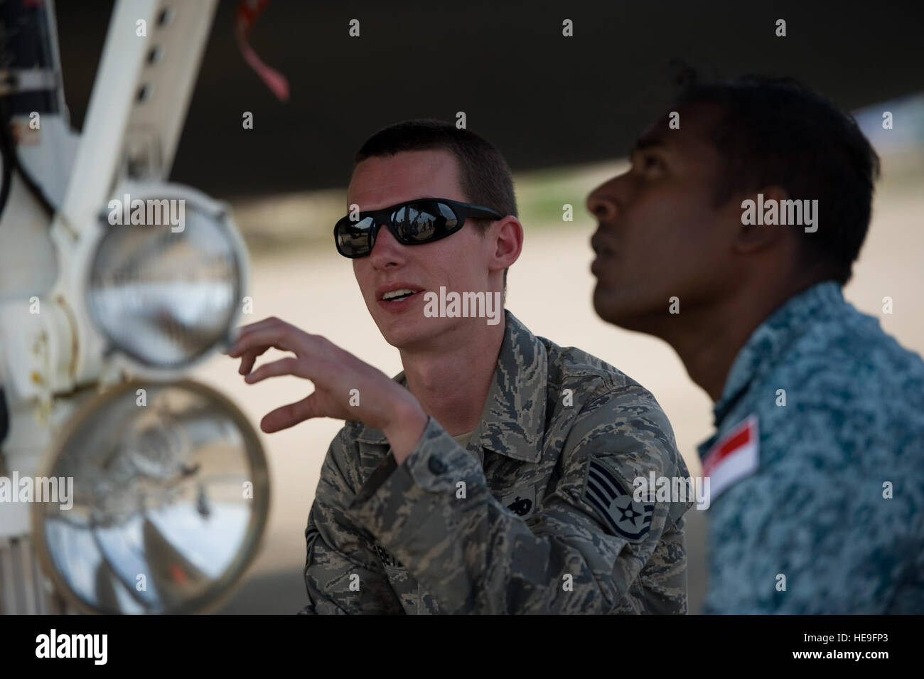 U.S. Air Force Staff Sgt. Curtis Betz, left, an F-15C Eagle aircraft ...