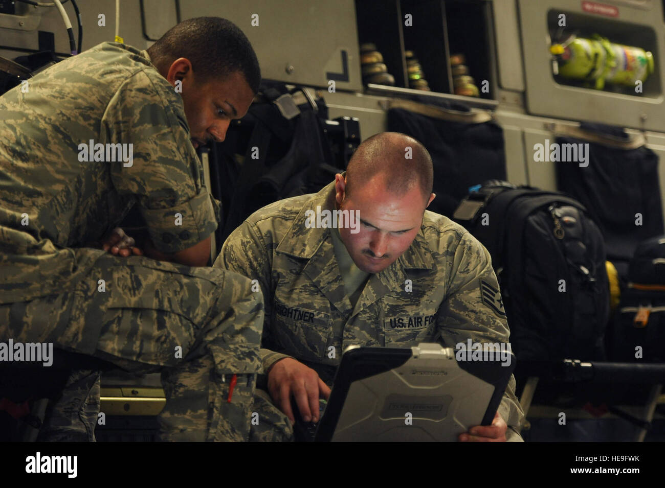 U.S. Air Force Staff Sgt. Mathew Leightner, right, and Staff Sgt ...