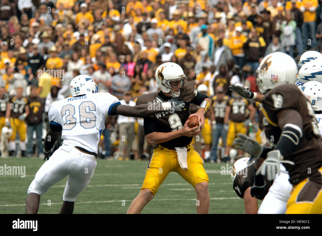 U.S. Air Force Academy linebacker Andre Morris makes sure Wyoming ...