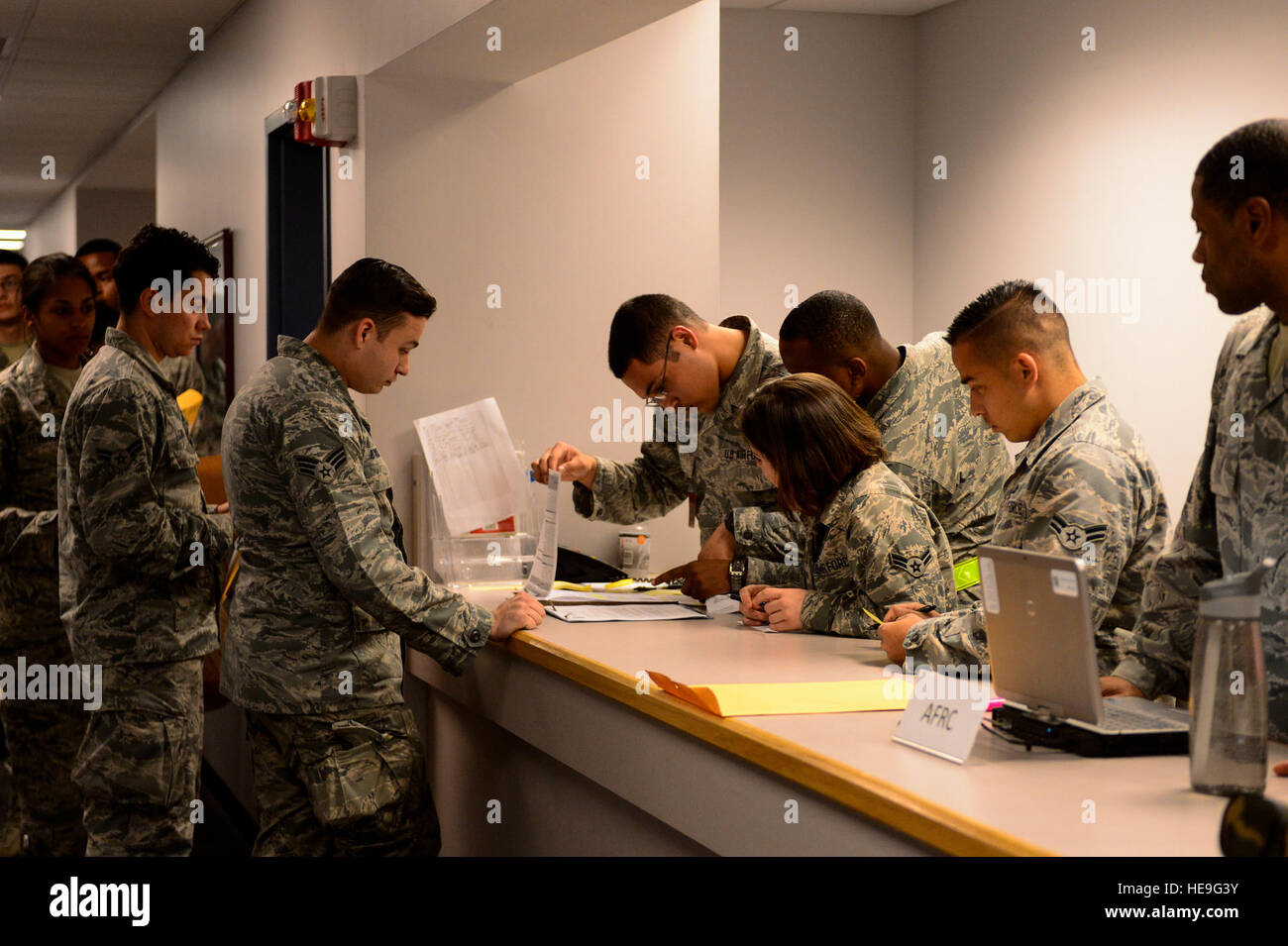 U.S. Air Force Airmen with the 628th Force Support Squadron assist with ...