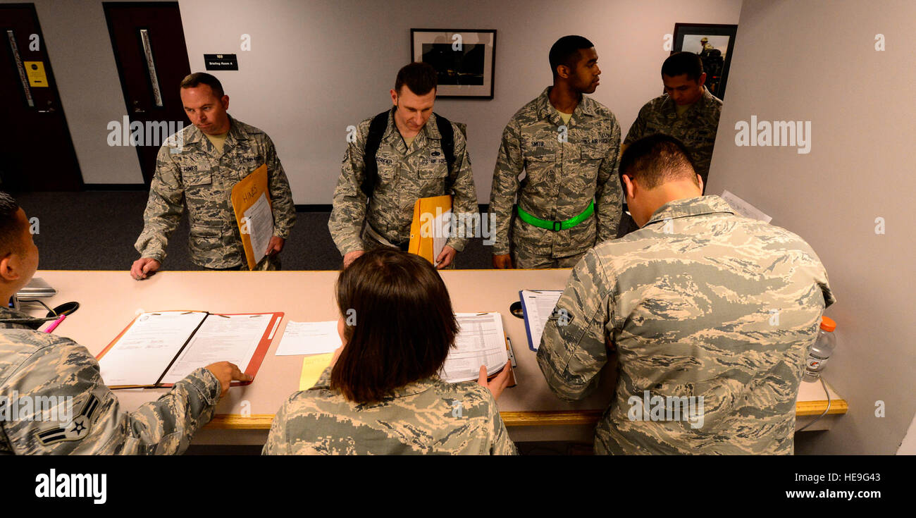 U.S. Air Force Airmen with the 628th Force Support Squadron assist with ...