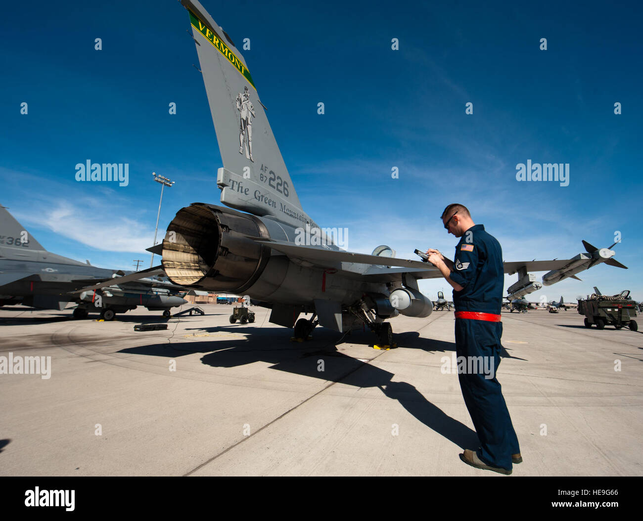 F-16 Fighting Falcon crew chiefs conduct pre-flight checks at Nellis ...