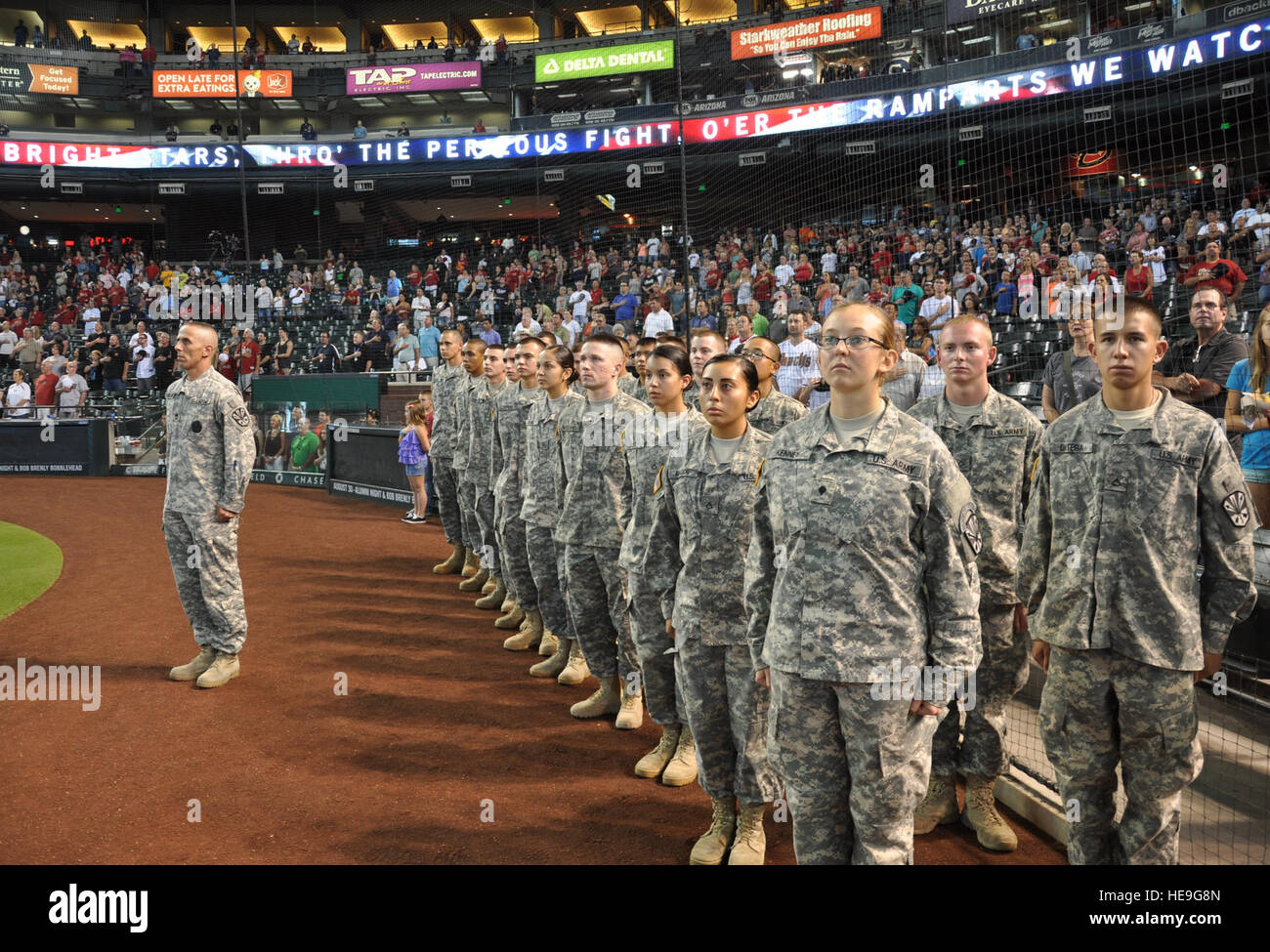 Arizona Army National Guard Soldiers stand at attention during the ...
