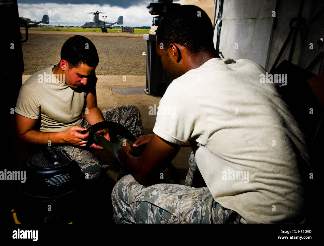 U.S. Air Force Staff Sgts. Nicholas Burdick and Sergio McLaughlin ...