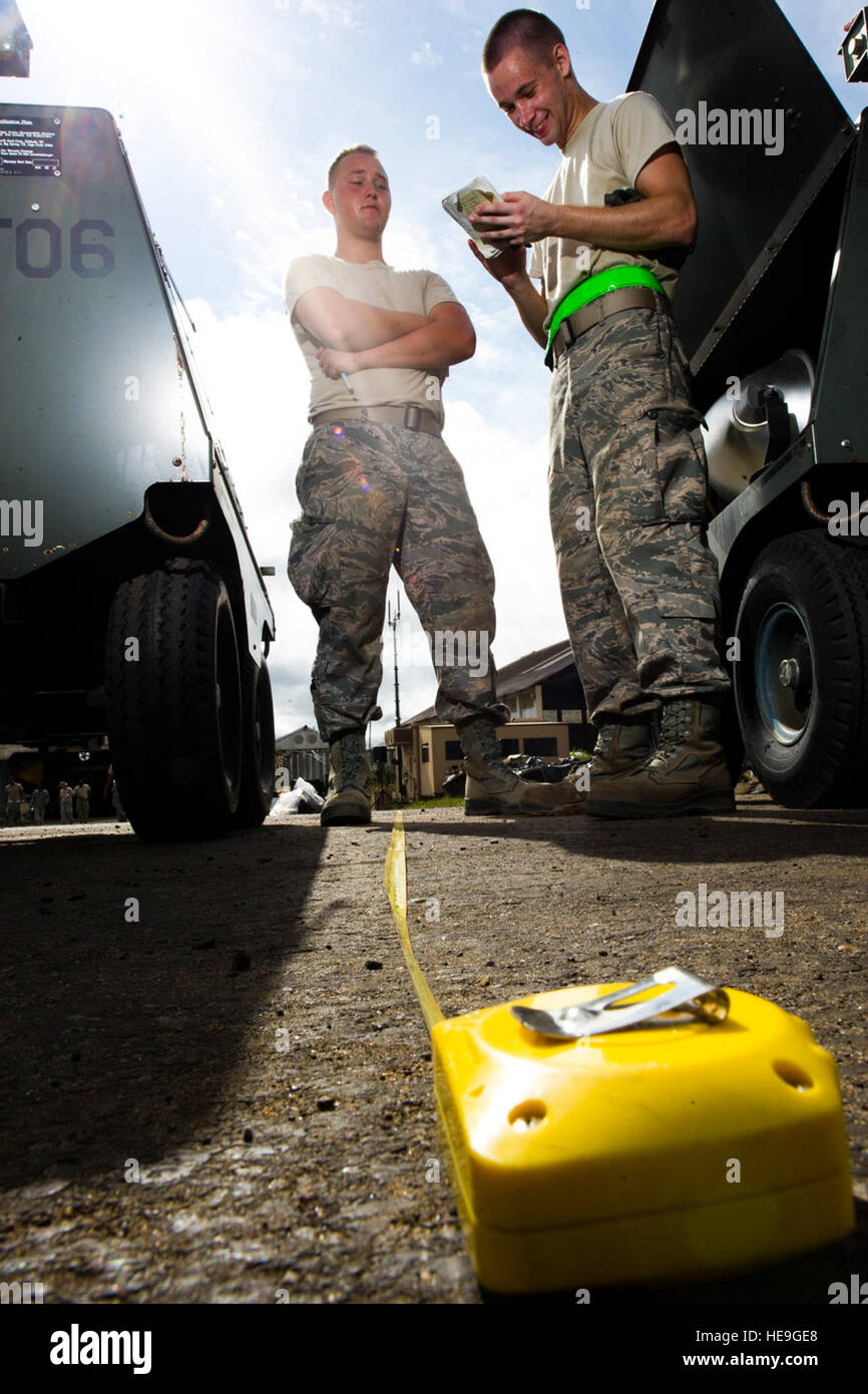 U.S. Air Force Staff Sgt. James Cain and Senior Airman Kavion Bryan ...