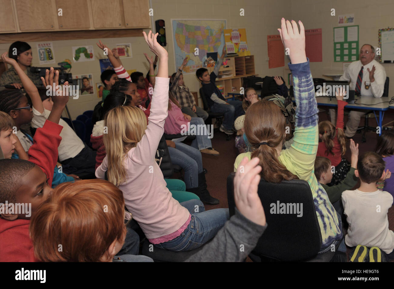 Mr. Sandy Loomis,Curry County Deputy Sherif, briefs children at the ...