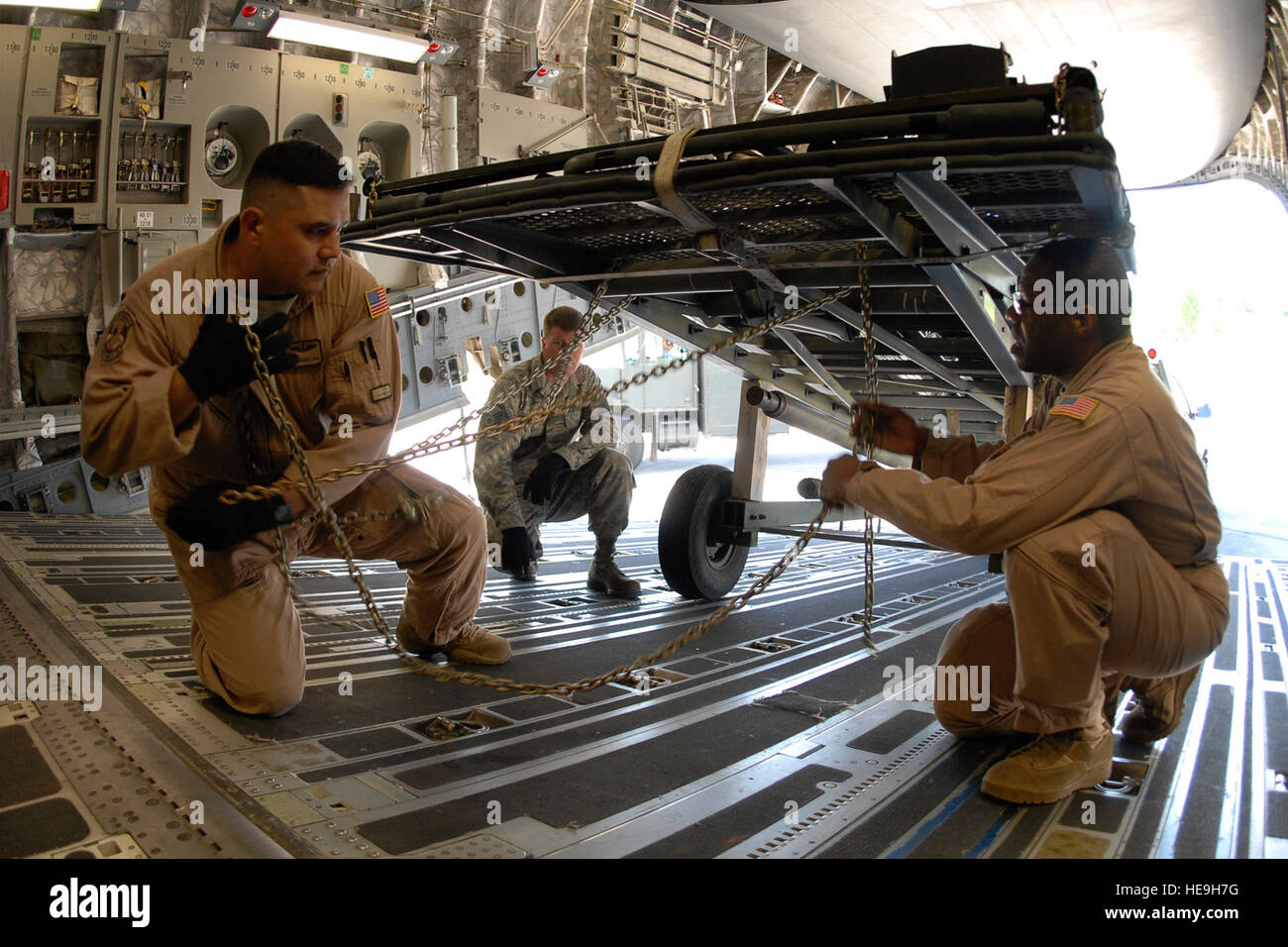 (Left to right) Master Sgt. Michael Lang, Master Sgt. Rawdon Naumann ...