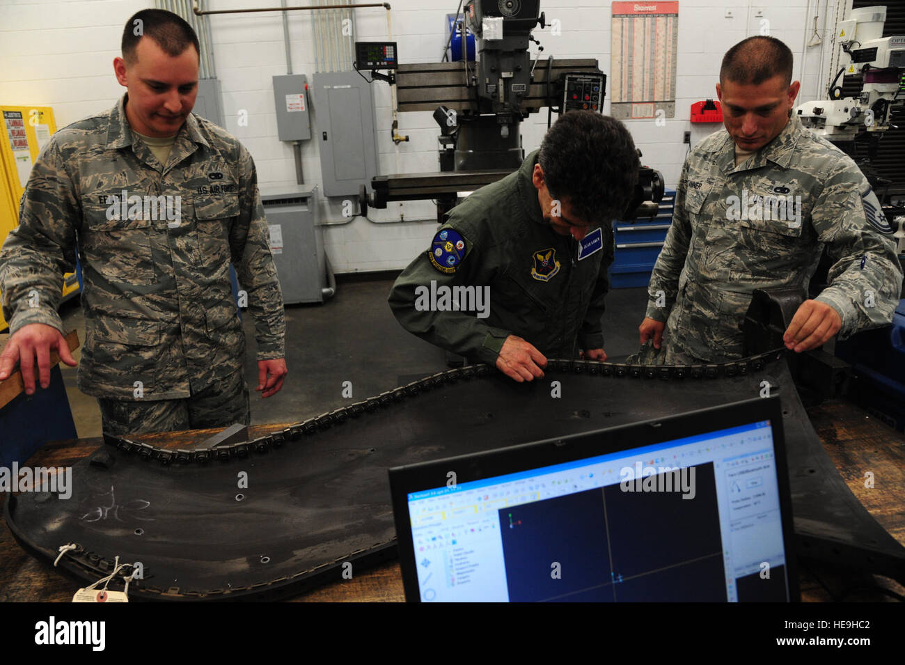 U.S. Air Force Senior Airman Matthew Ebarb, a 509th Maintenance Squadron aircraft metals ...