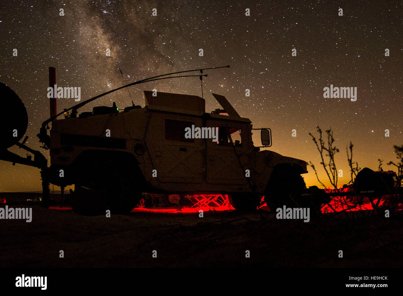 A Humvee sits at night during Decisive Action Rotation 14-09 at the ...