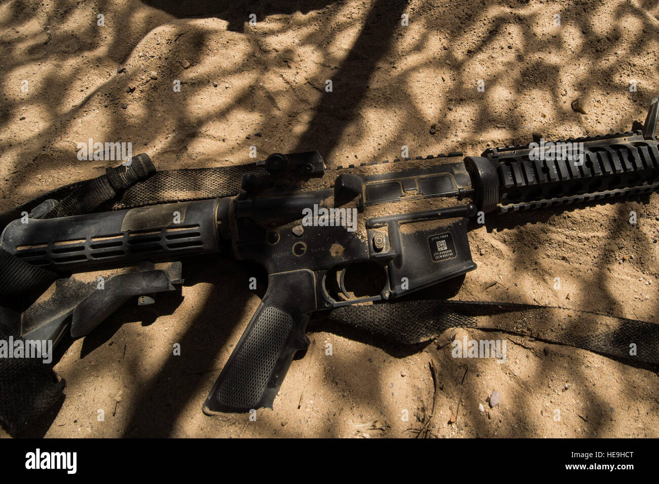 An M4 Carbine is exposed to the sands and heat of the California desert ...