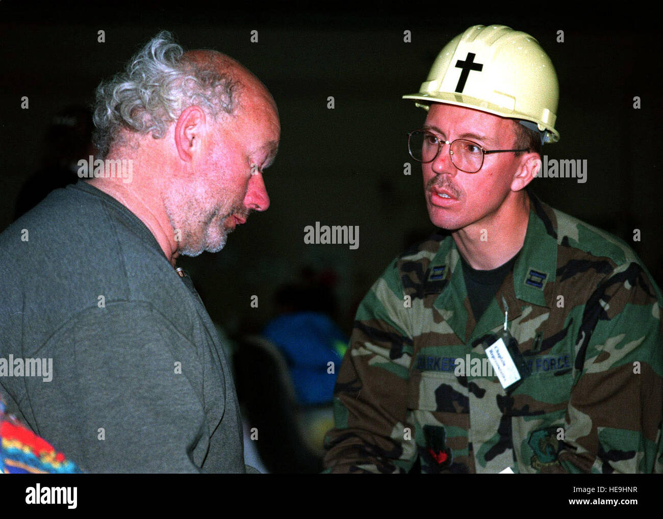 On April 24, 1997, Air Force chaplains and personnel assisted thousands ...