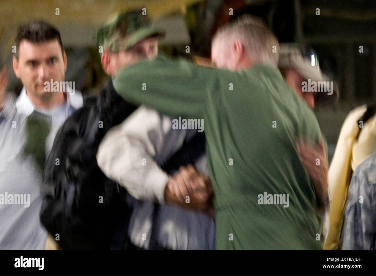 At the top of the cargo ramp of a C-17 Globemaster III, Keith Stansell ...