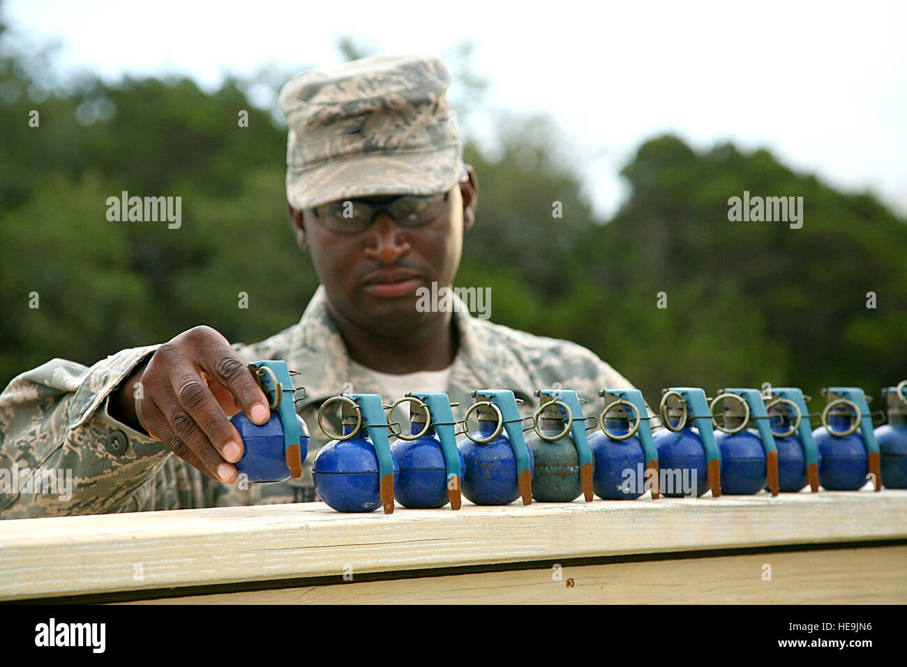 A U.S. Air Force instructor with the 343rd Training Squadron prepares M ...