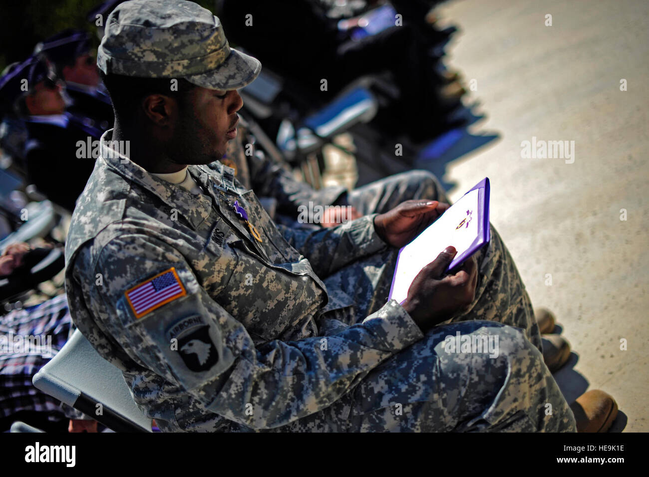 Pfc. Milton Jenkins reads an official citation after Deputy Secretary ...