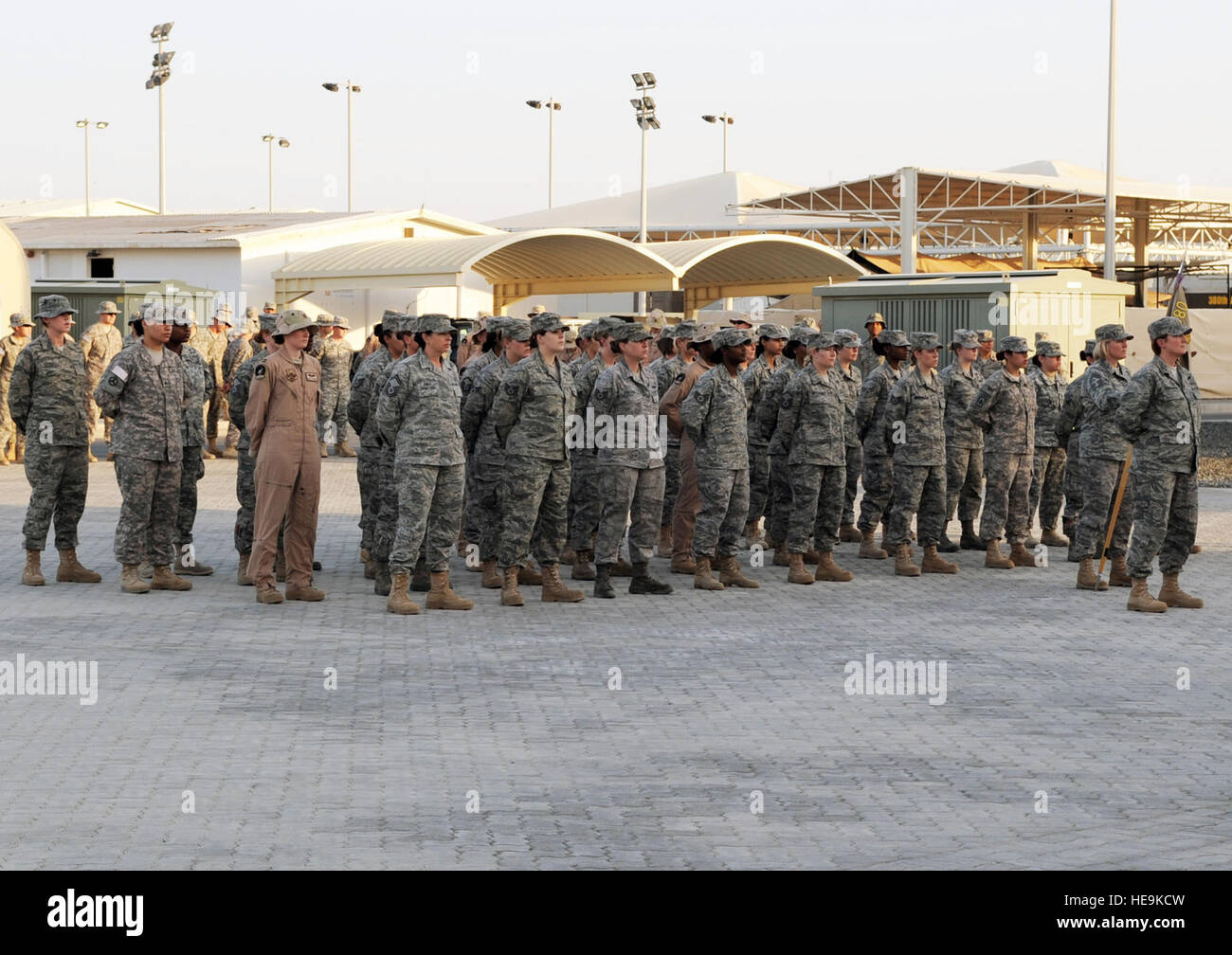 Female Airmen and Soldiers stand in an all-women formation as part of a ...