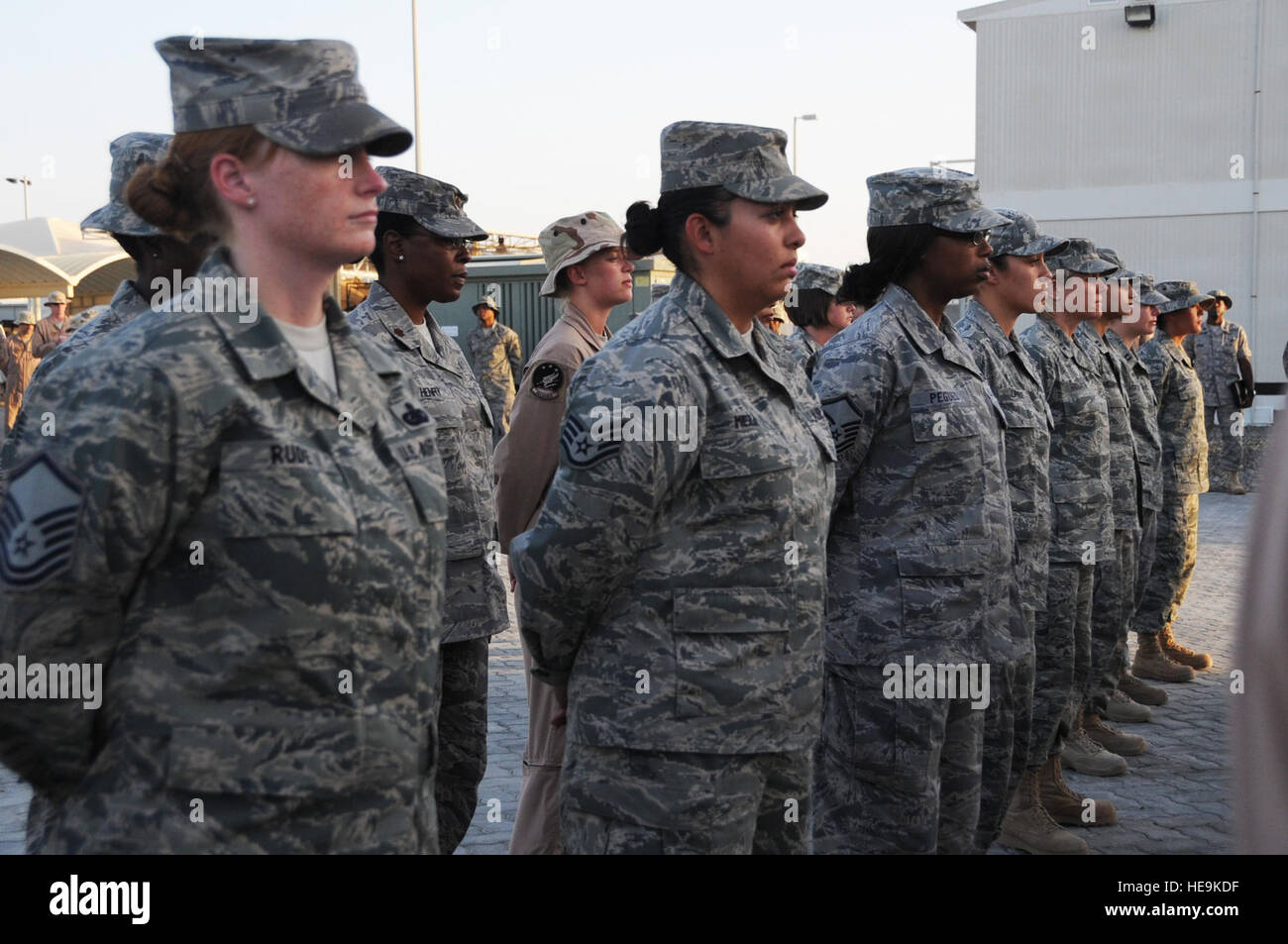 Female Airmen and Soldiers stand in an all-women formation as part of a ...