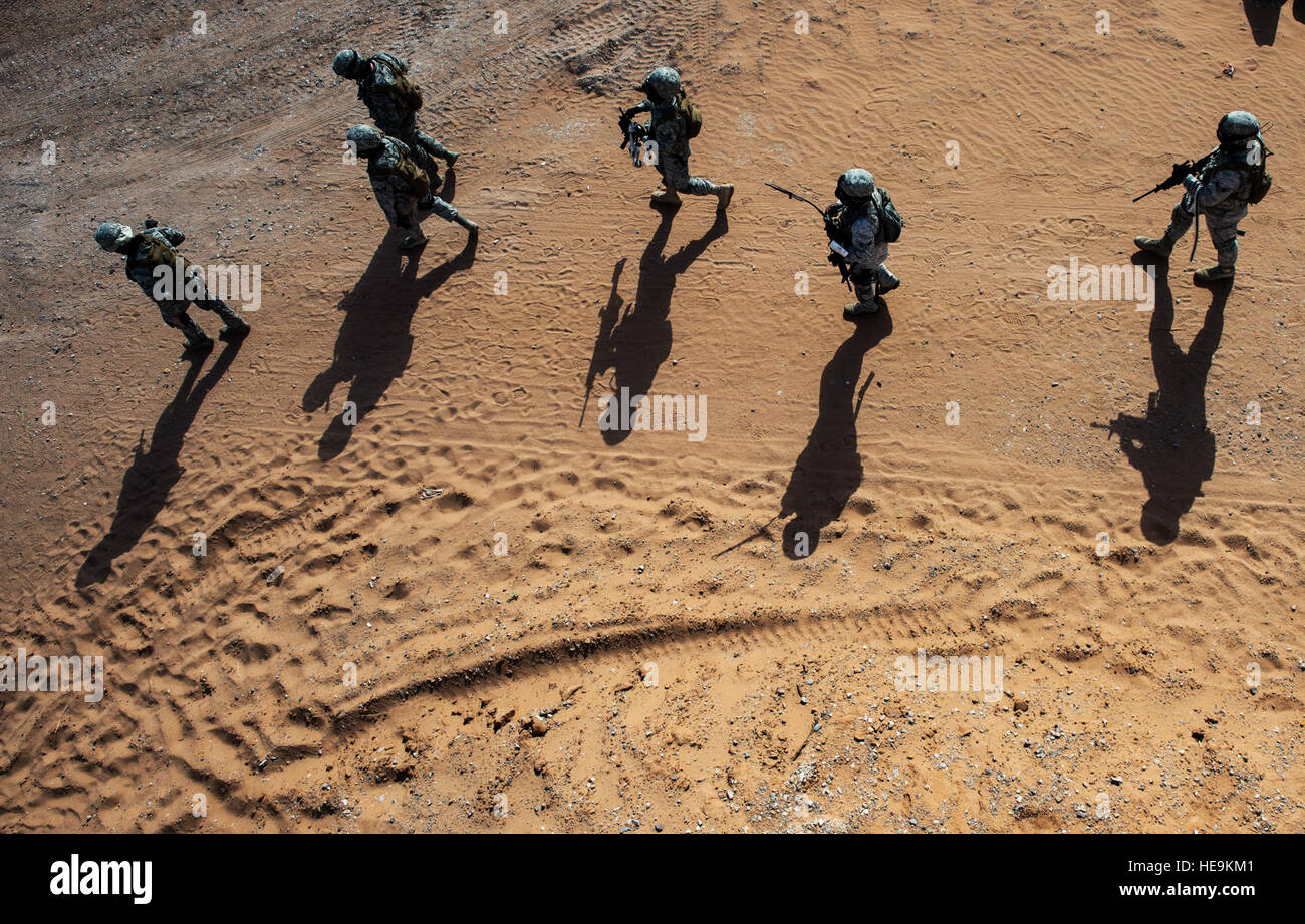 Security forces Airmen walk through a training area on Fort Bliss ...