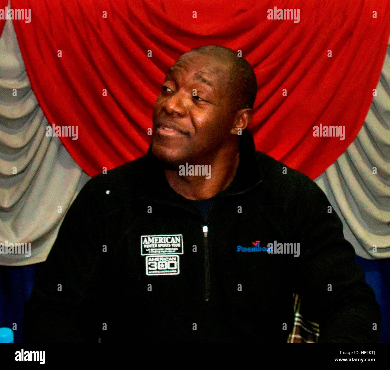 Devon Harris, three-time bobsled Olympian, greets troops at the Transit ...