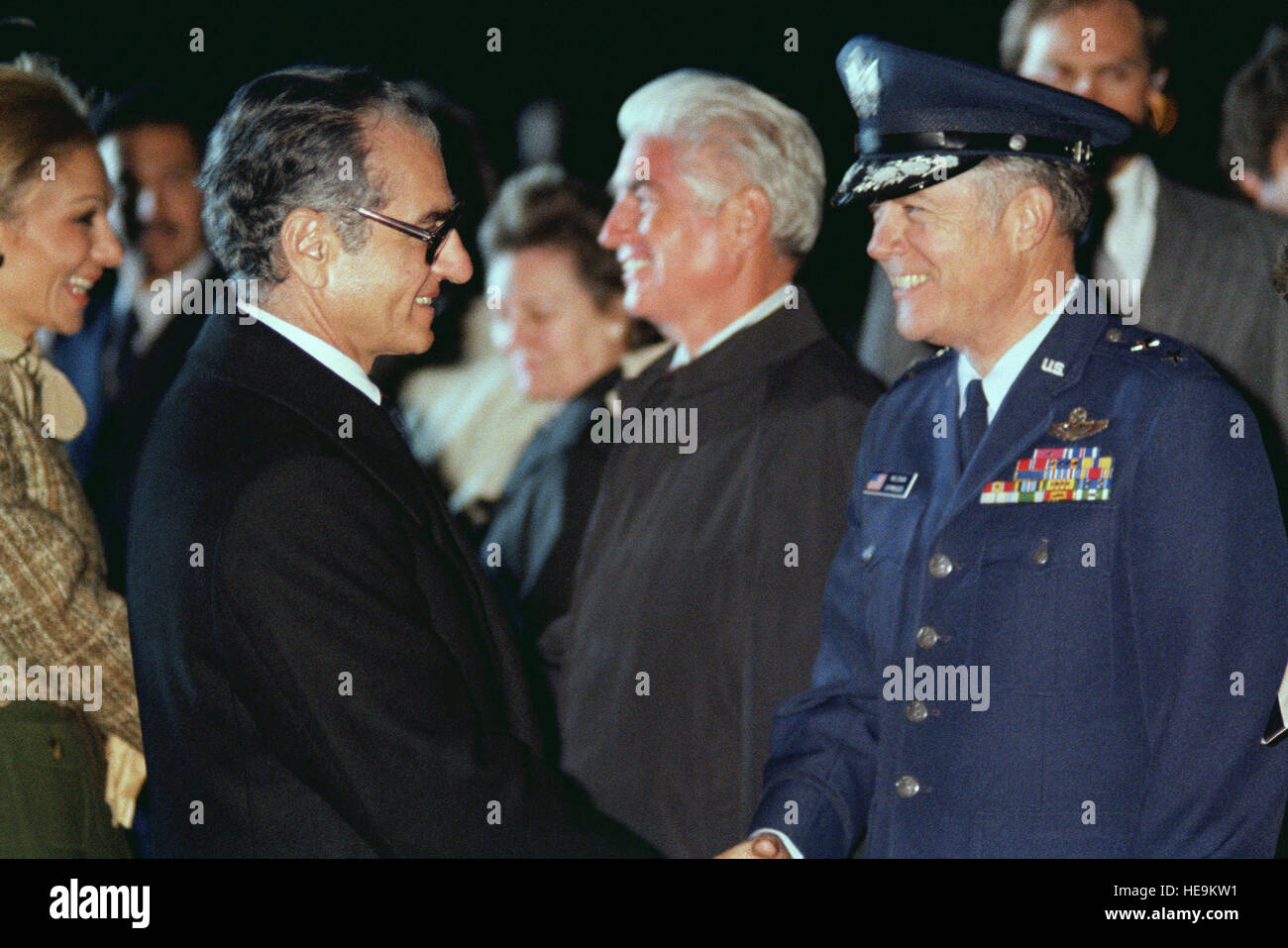 Mohammed Reza Pahlavi, Shah of Iran, shakes hands with a US Air Force ...