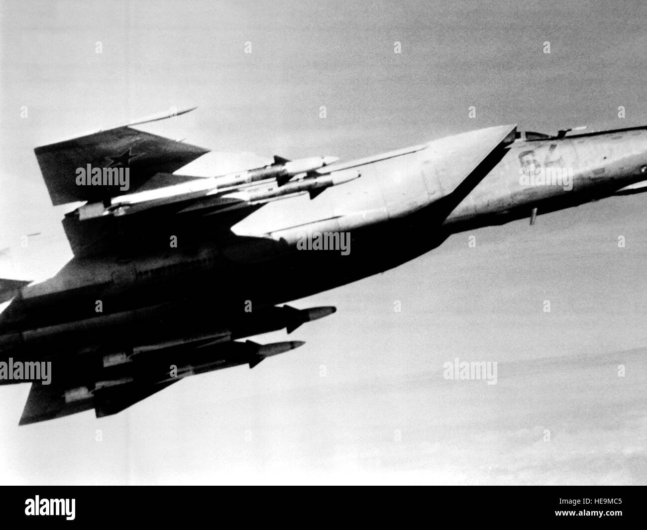 An air-to-air right underside view of a Soviet MiG-25 Foxbat aircraft ...
