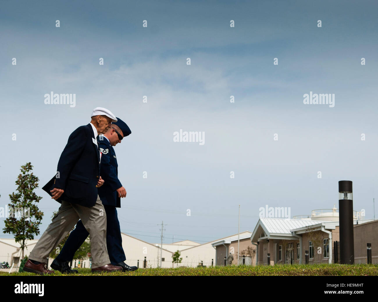 Retired Lt. Col. Dick Cole is escorted into a ceremony where a air ...