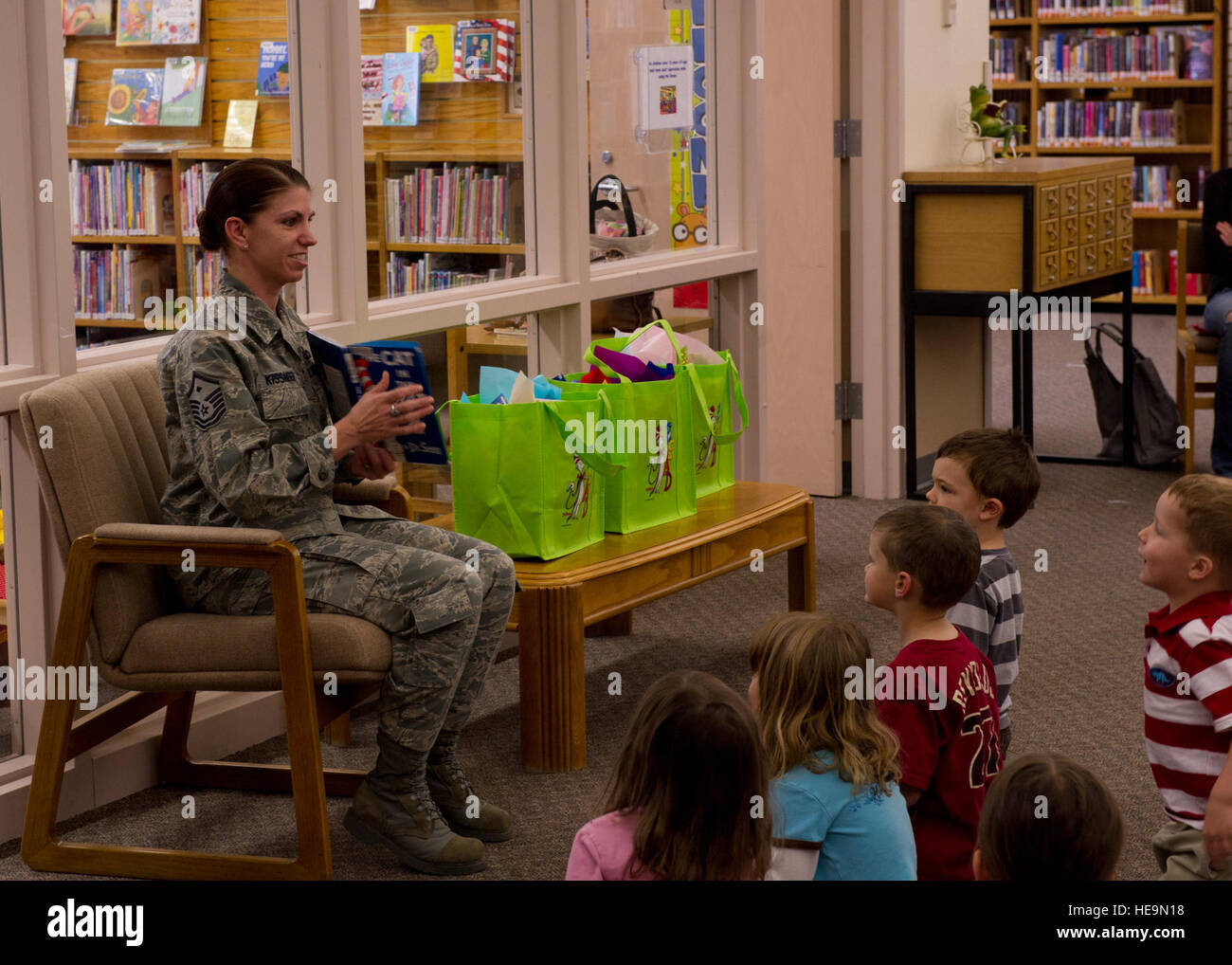 Master Sgt. Tamara Kissinger, 49th Operations Support Squadron first sergeant, reads “The Cat in ...