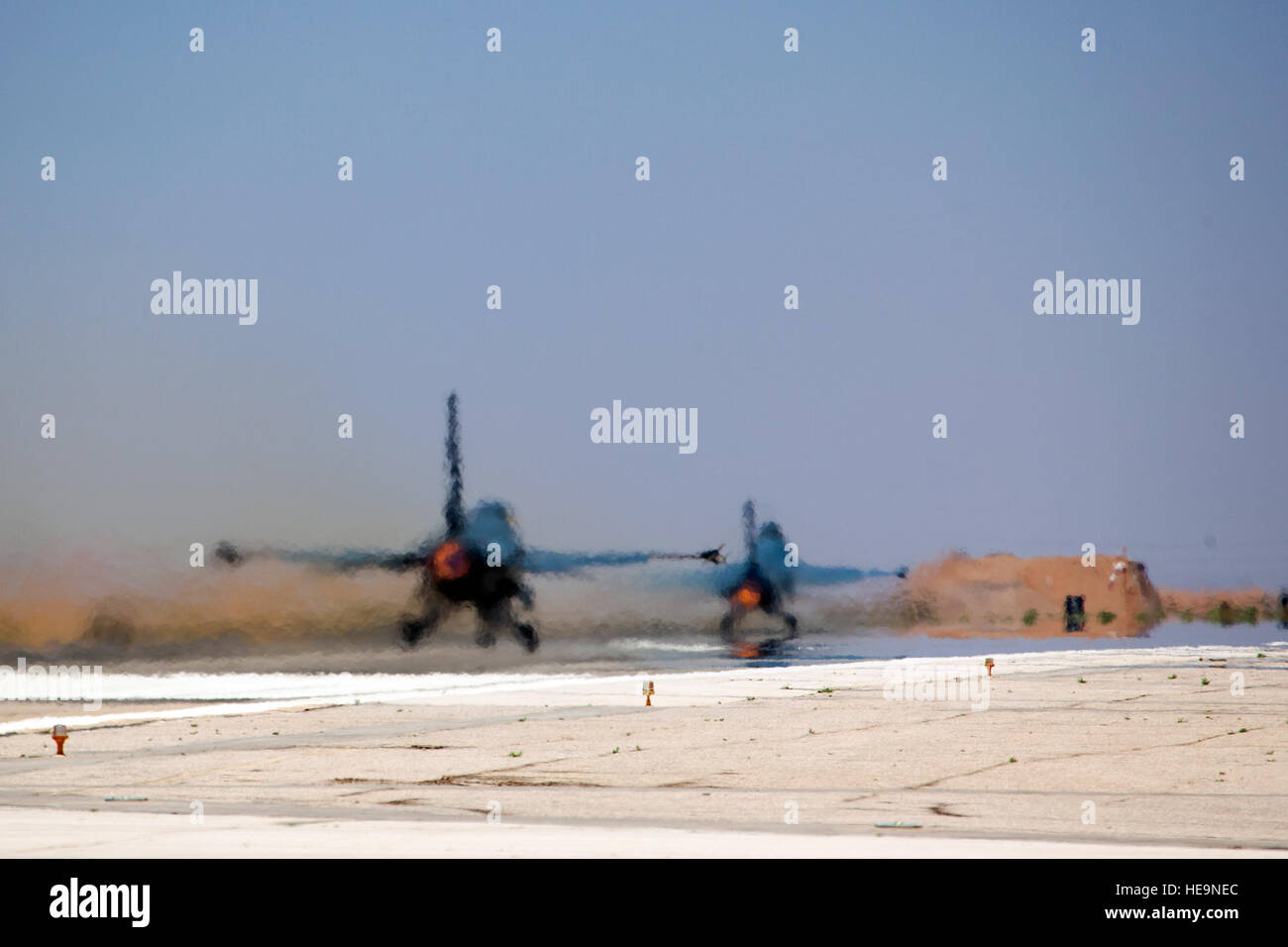 Two Jordanian F-16 Fighting Falcons take off as part of a scramble ...