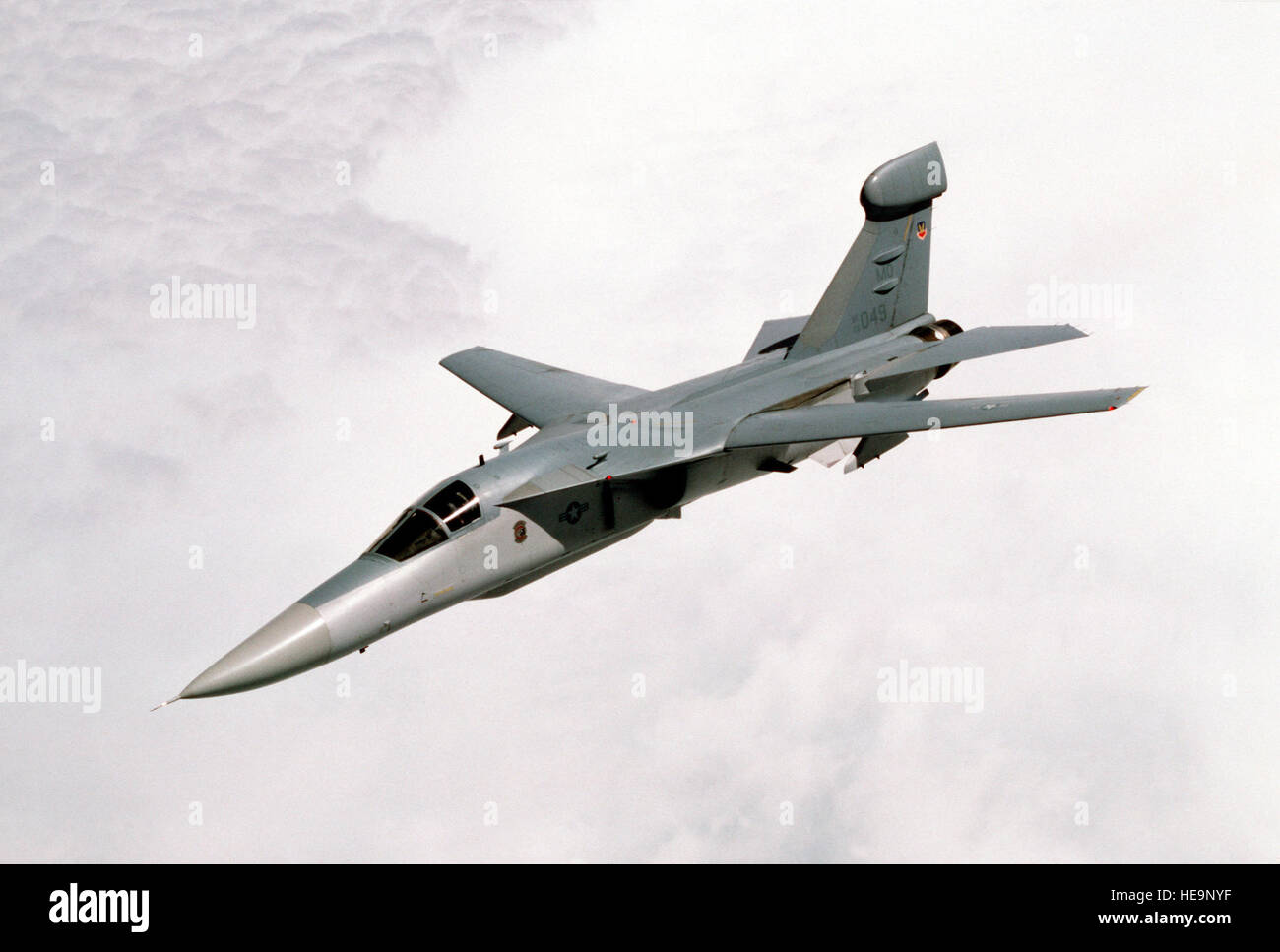 An EF-111A Raven aircraft supplies radar jamming support while enroute ...