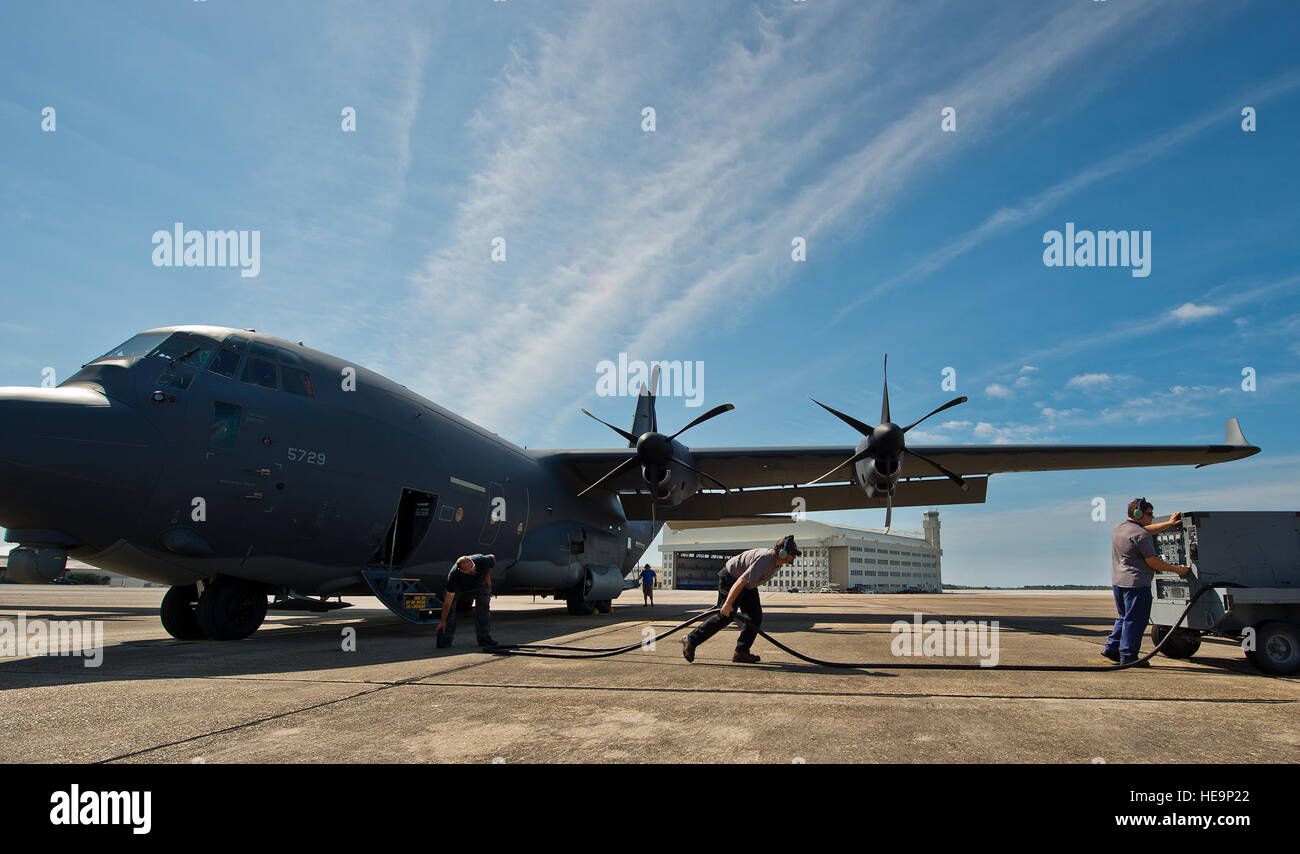 Lockheed Martin maintenance contractors pull the generator cable way ...