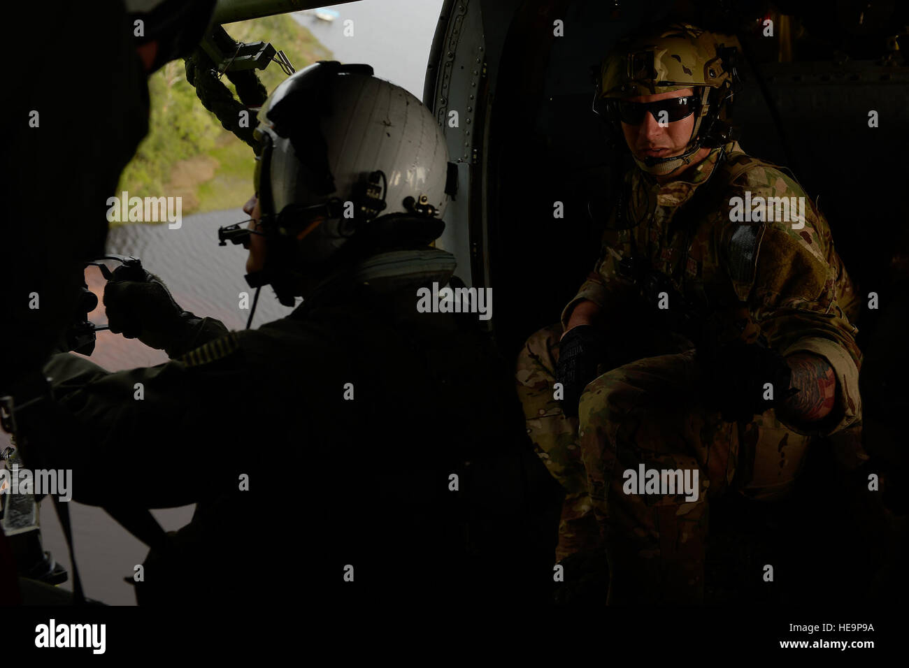 A U.S. Air Force combat controller instructor, right, with the Special ...