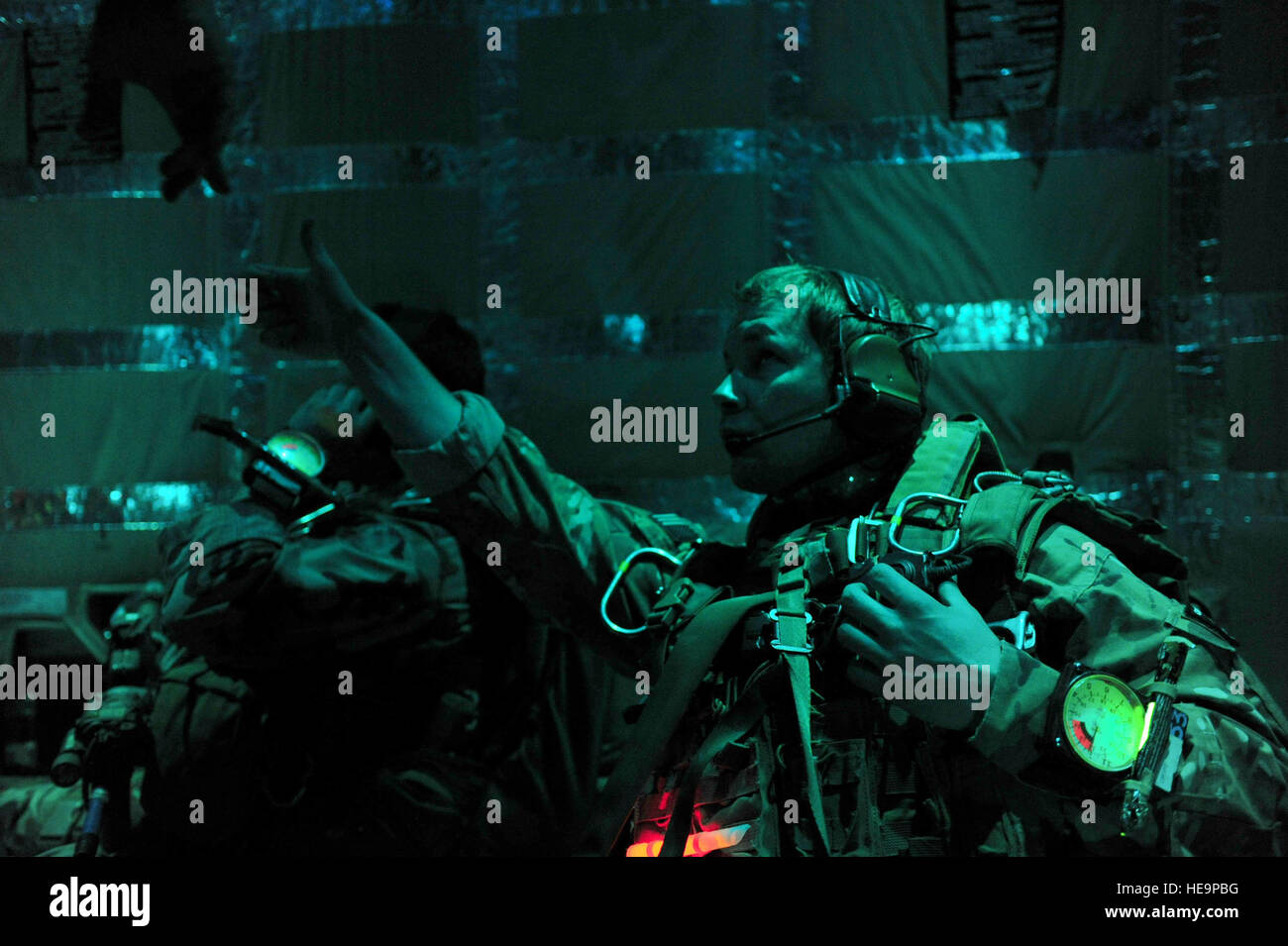 U.S. Army Special Forces soldiers prepare for a night time jump during ...