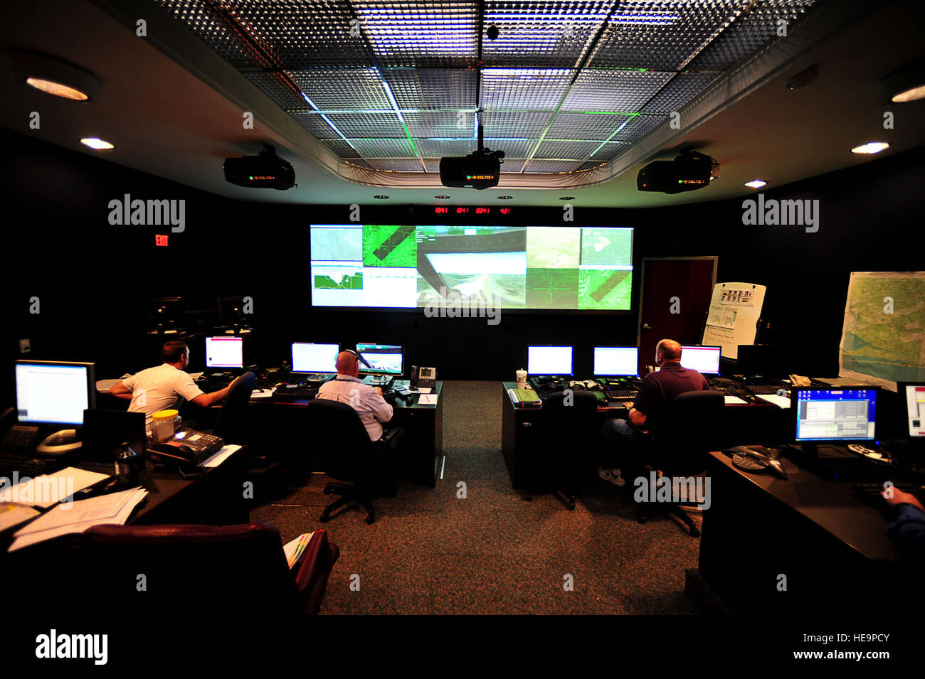 Civilian personnel from Lockheed Martin Corp. administer and observe a ...