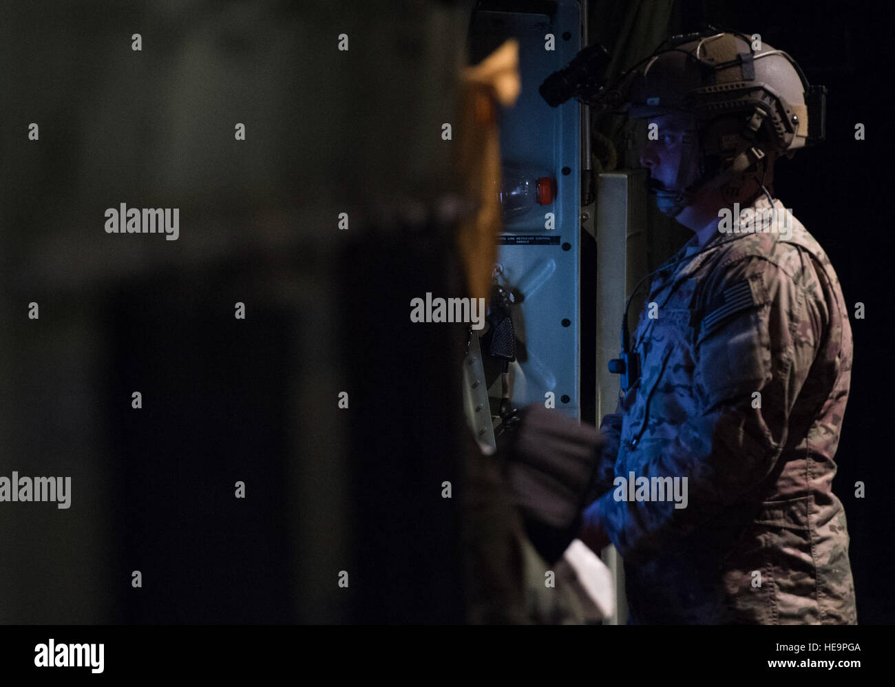 A U.S. Air Force 9th Special Operations Squadron loadmaster observes ...