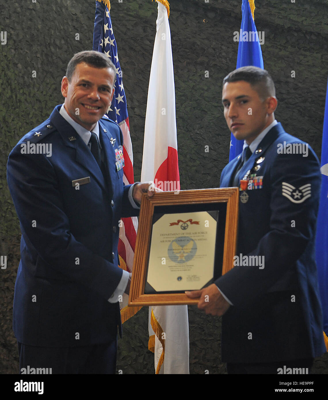 U.S. Air Force Staff Sgt. Michael Vallejo (right), 18th Civil Engineer ...