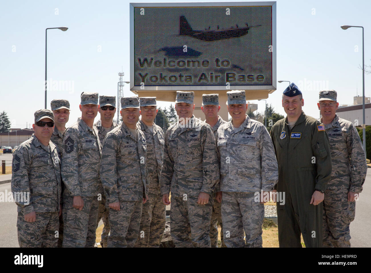 Lt. Gen. Carlton D. Everhart II, 18th Air Force commander, center, and ...