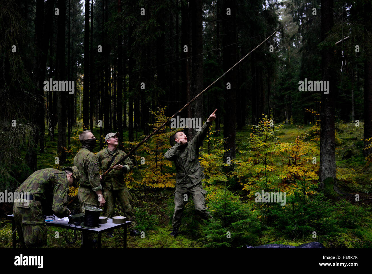 Lithuanian soldiers construct a Field Expedient Antenna as part of the ...