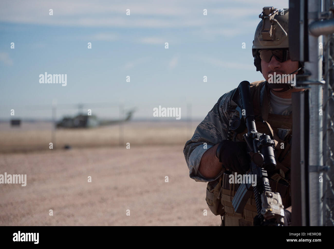 Senior Airman Ronnie Perez, 90th Security Forces Group Tactical Response Force, guards the ...