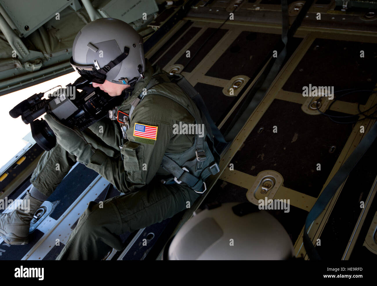 Airman 1st Class Andrew Walck, a combat aerial broadcaster with the 3rd Combat Camera Squadron ...