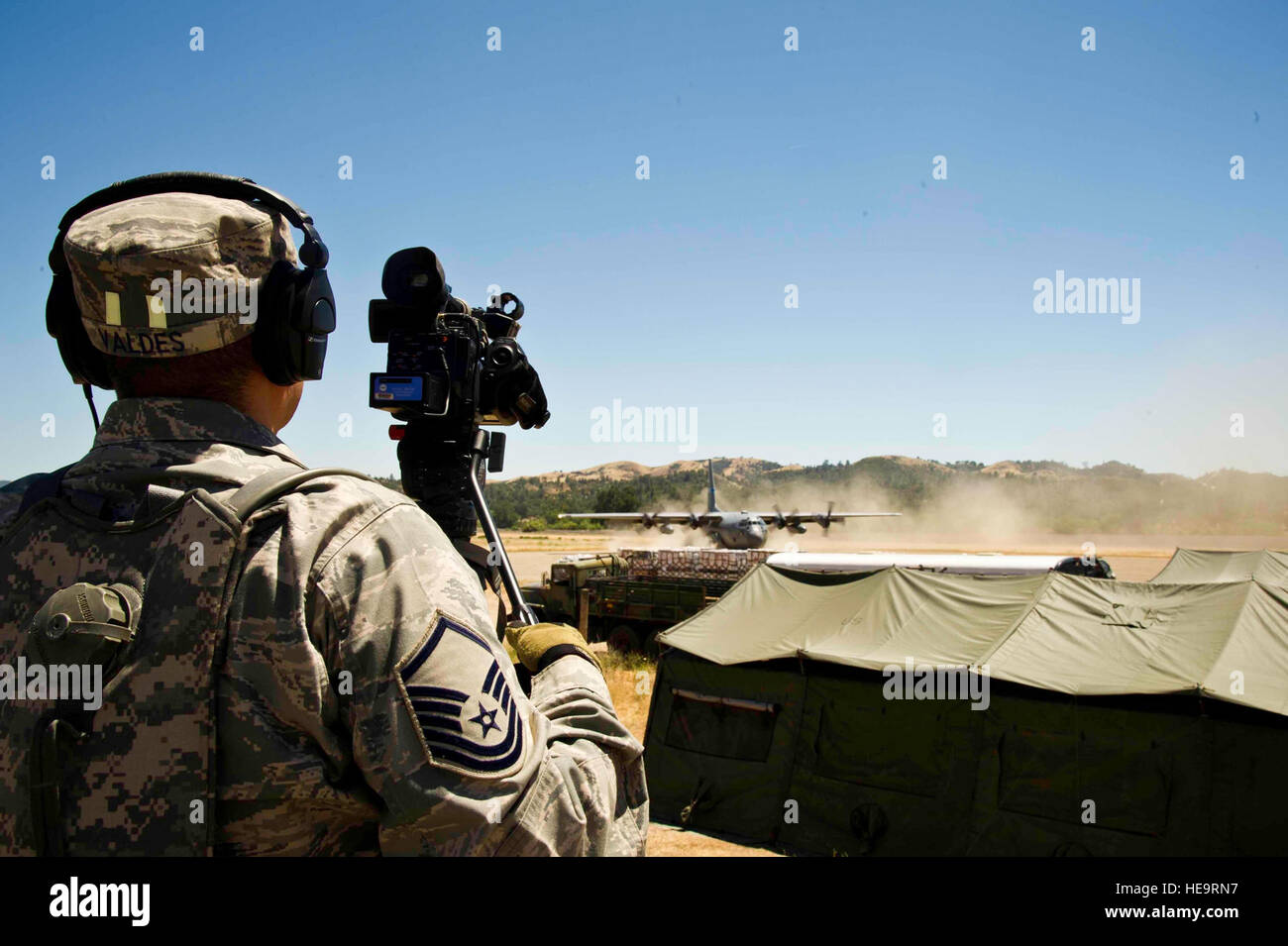 U.S. Air Force Master Sgt. Juan Valdes, a videographer with the 4th Combat Camera Squadron ...