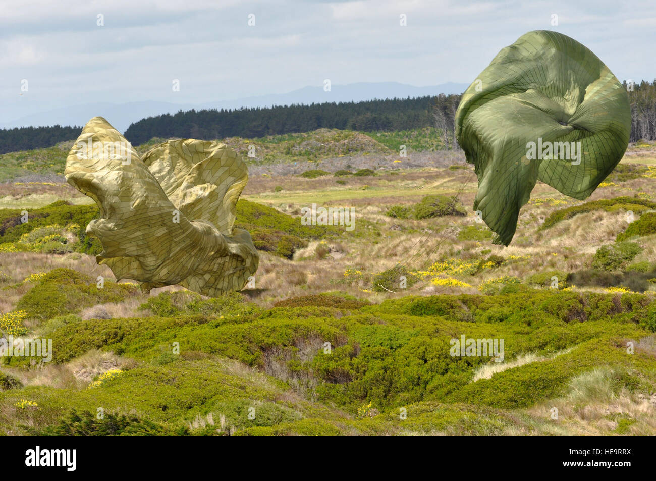 OHAKEA, New Zealand -- Two main parachutes billow briefly in the air as ...