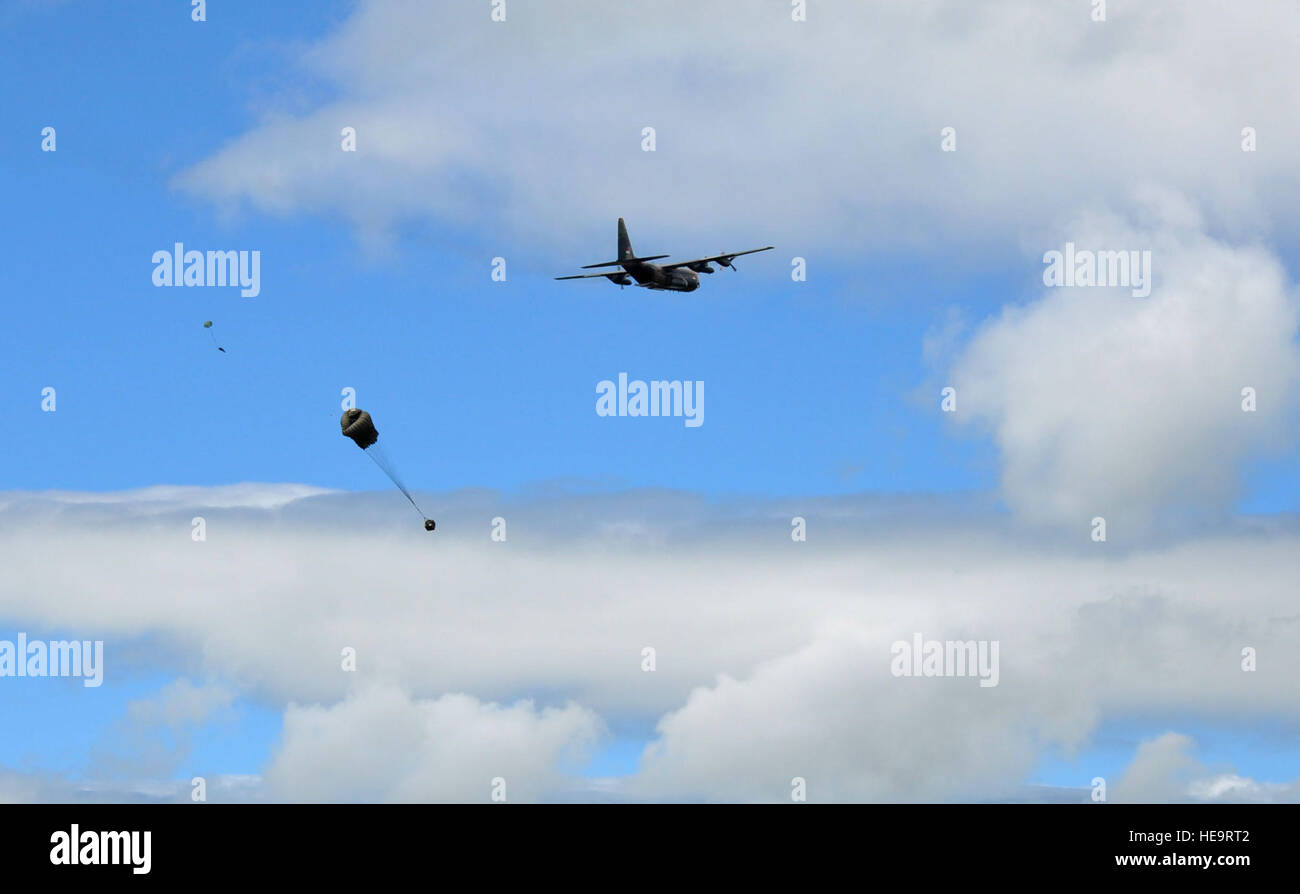 OHAKEA, New Zealand -- An extraction parachute (left) safely breaks ...