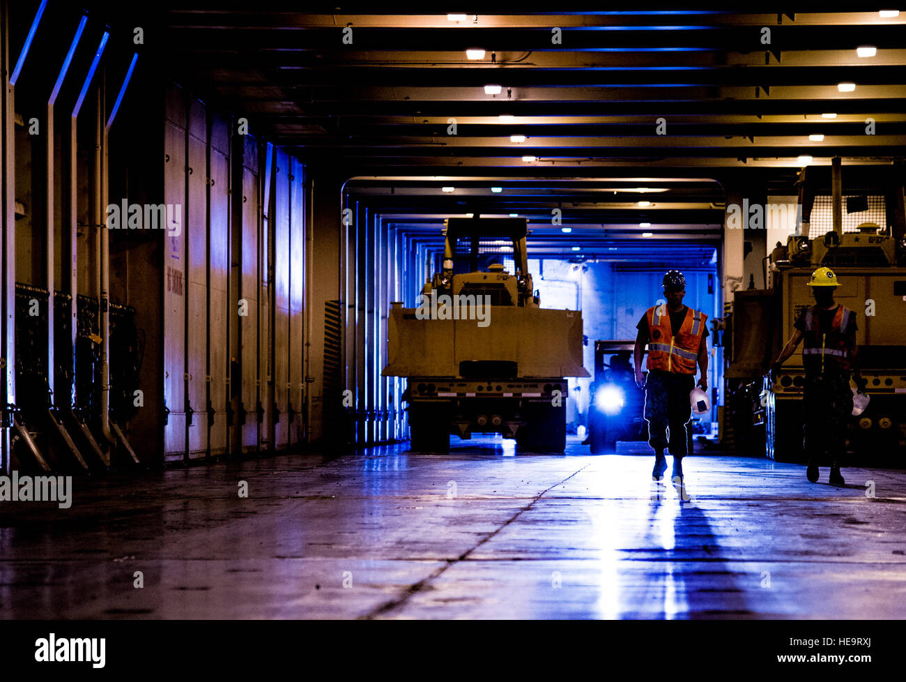 Sailors maneuver machinary during Exercise Turbo Distribution, a U.S ...