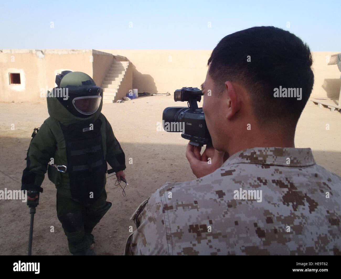 U.S. Marine Corps Cpl. Kowshon Ye, a Combat Camera videographer with ...