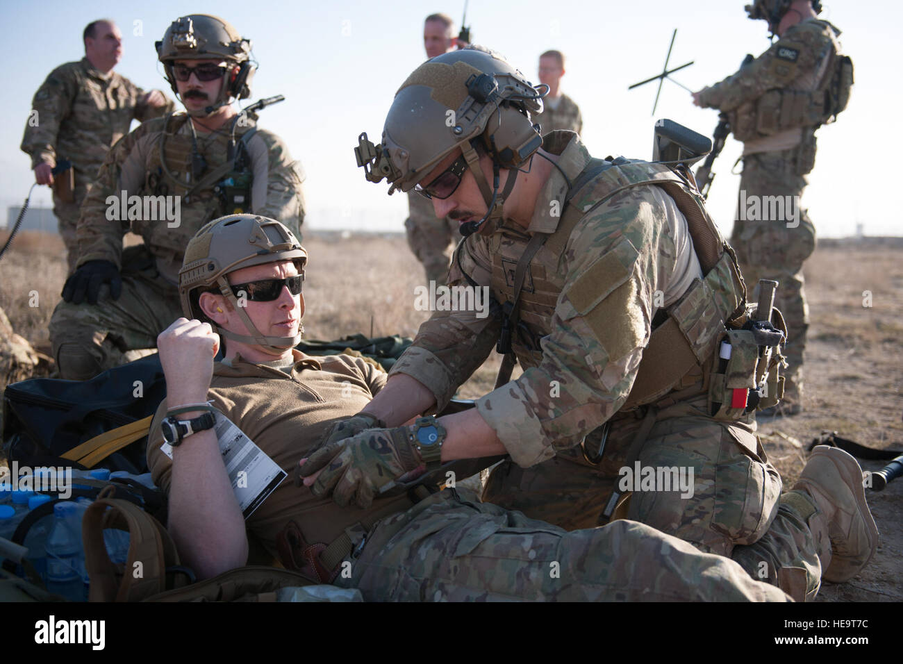 A pararescueman from the 83rd Expeditionary Rescue Squadron prepares a ...